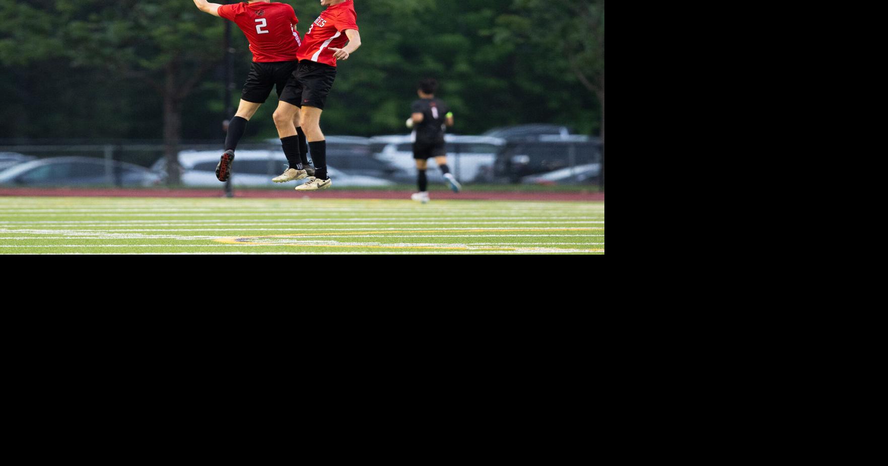 Boys soccer: Travis hits bullseye twice, Godwin wins title