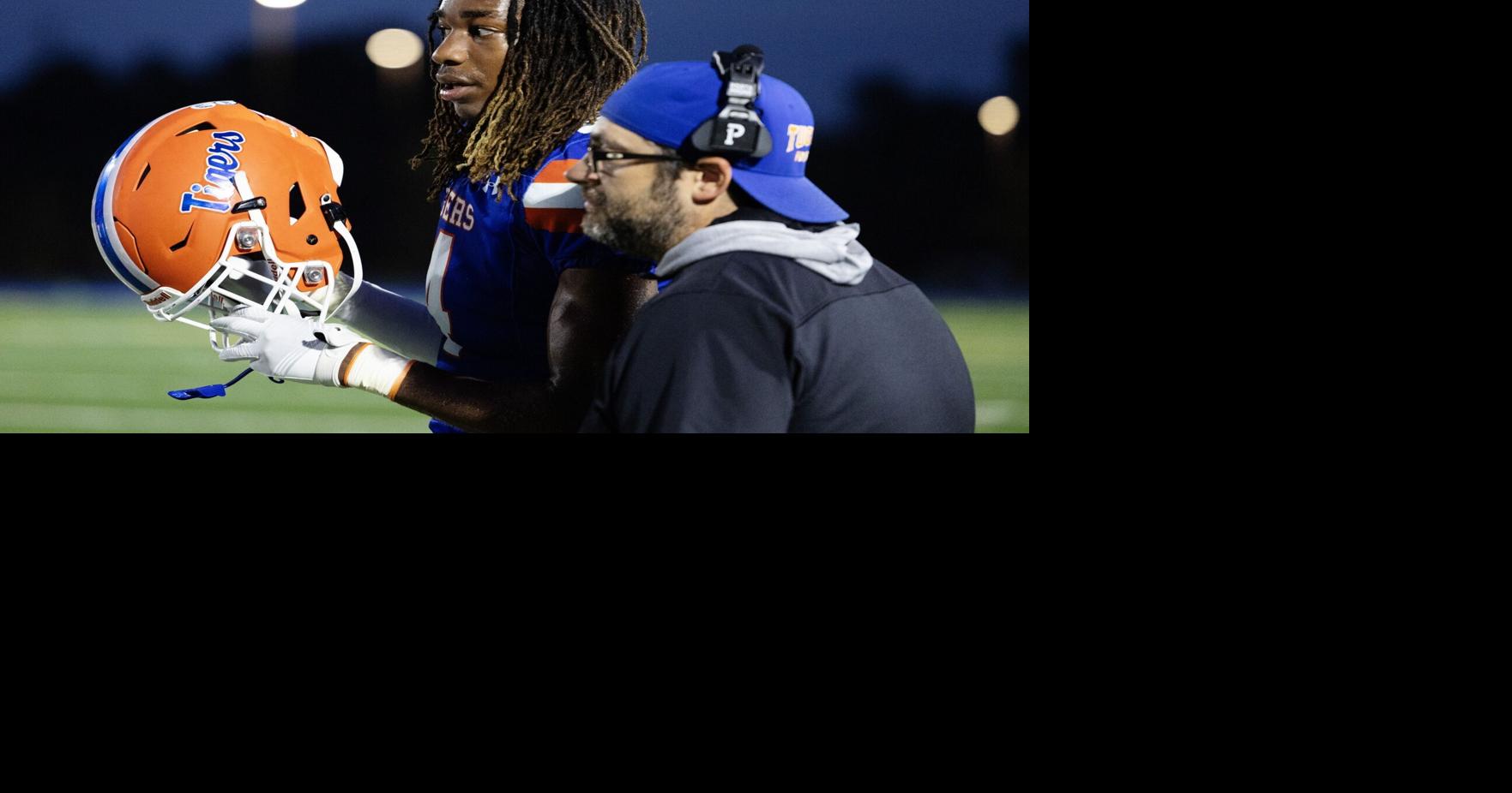 Tucker football's Douglas guides family, leads Tigers