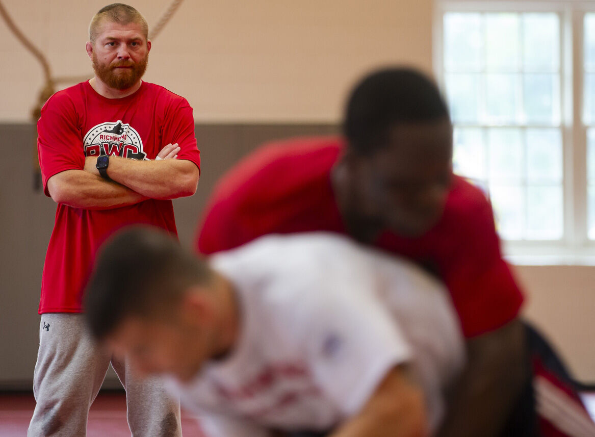 St. Chris's Owens to coach at World Wrestling Championships