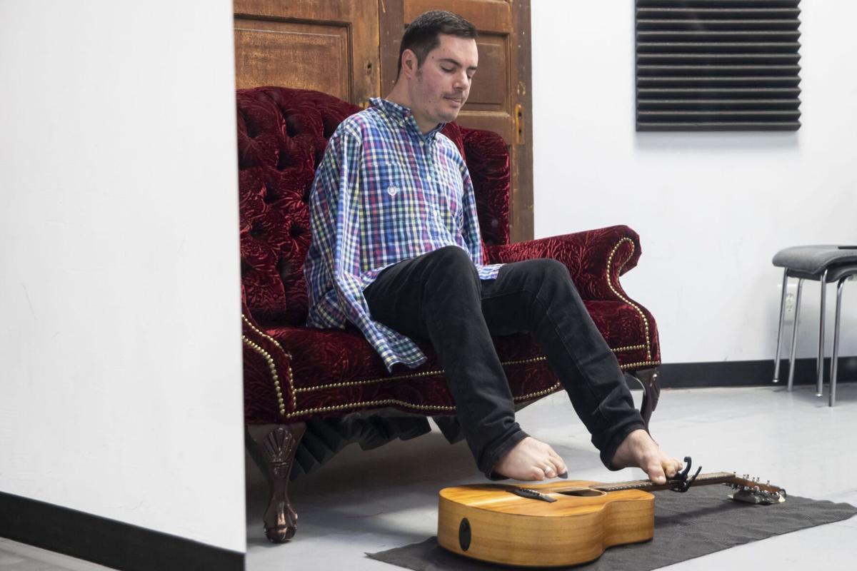 George Dennehy, born without arms, reflects on music career