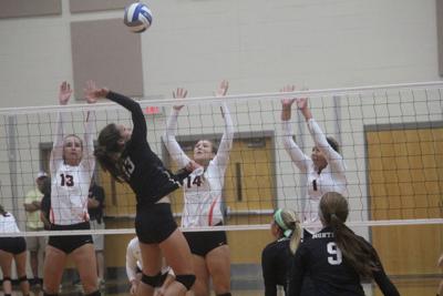 Powhatan takes down Mustangs in four sets