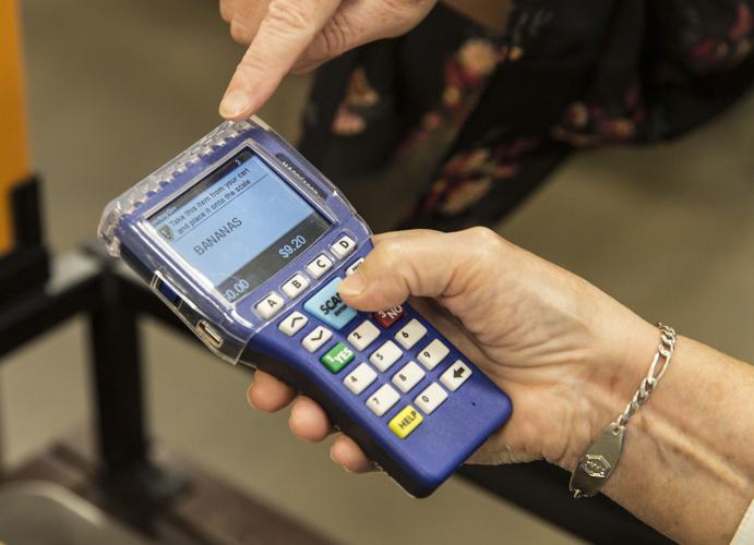 Avoiding the grocery checkout line: Kroger debuts self Scan, Bag, Go ...