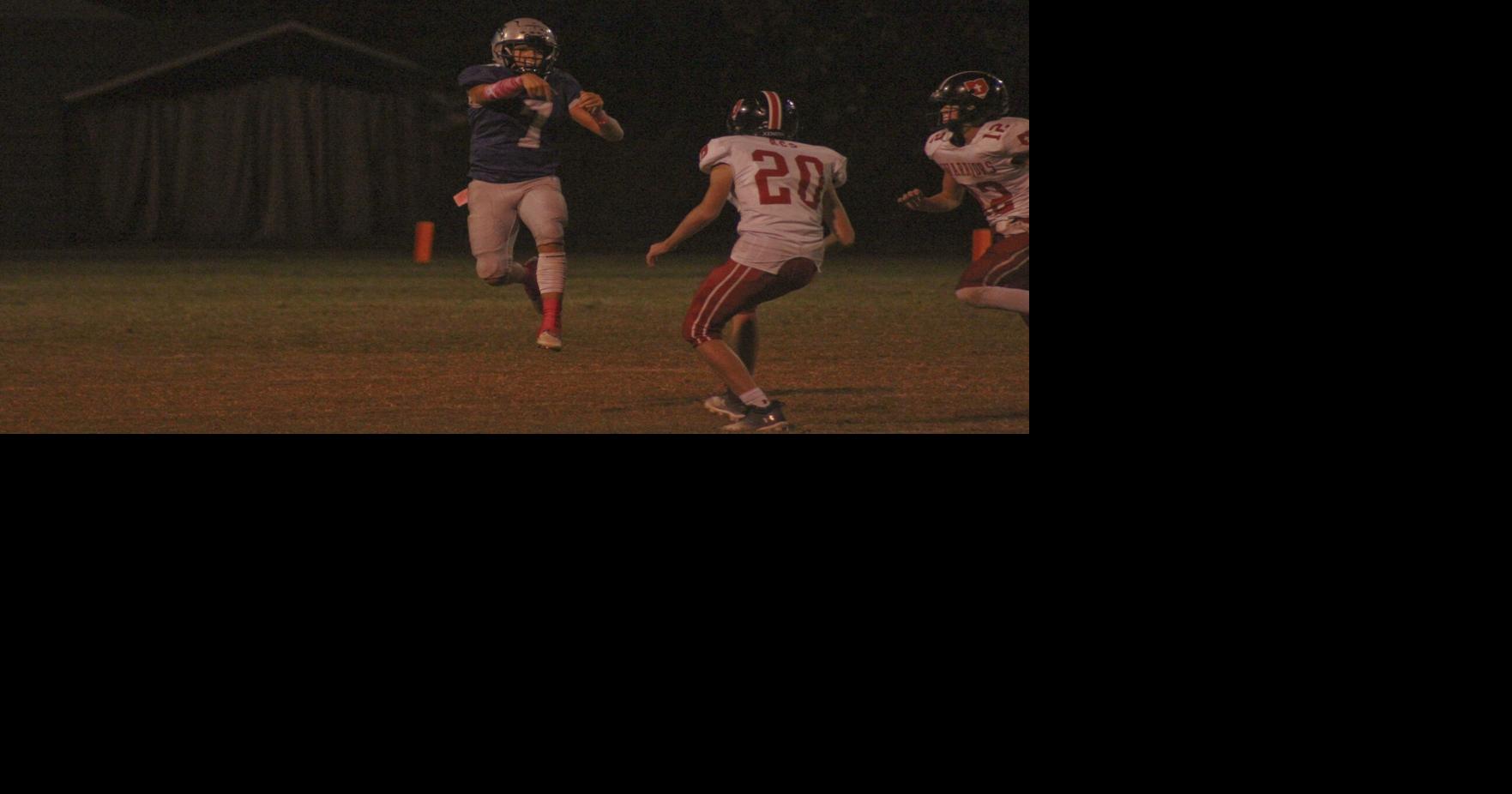 Homecoming king Quinlan scores five touchdowns in blowout win