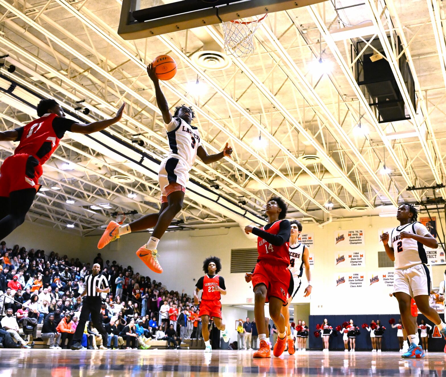 Photos: Manchester boys basketball routs Gainesville in state quarterfinal