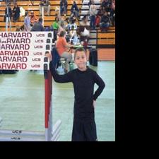 Omohundro sets AAU long jump mark