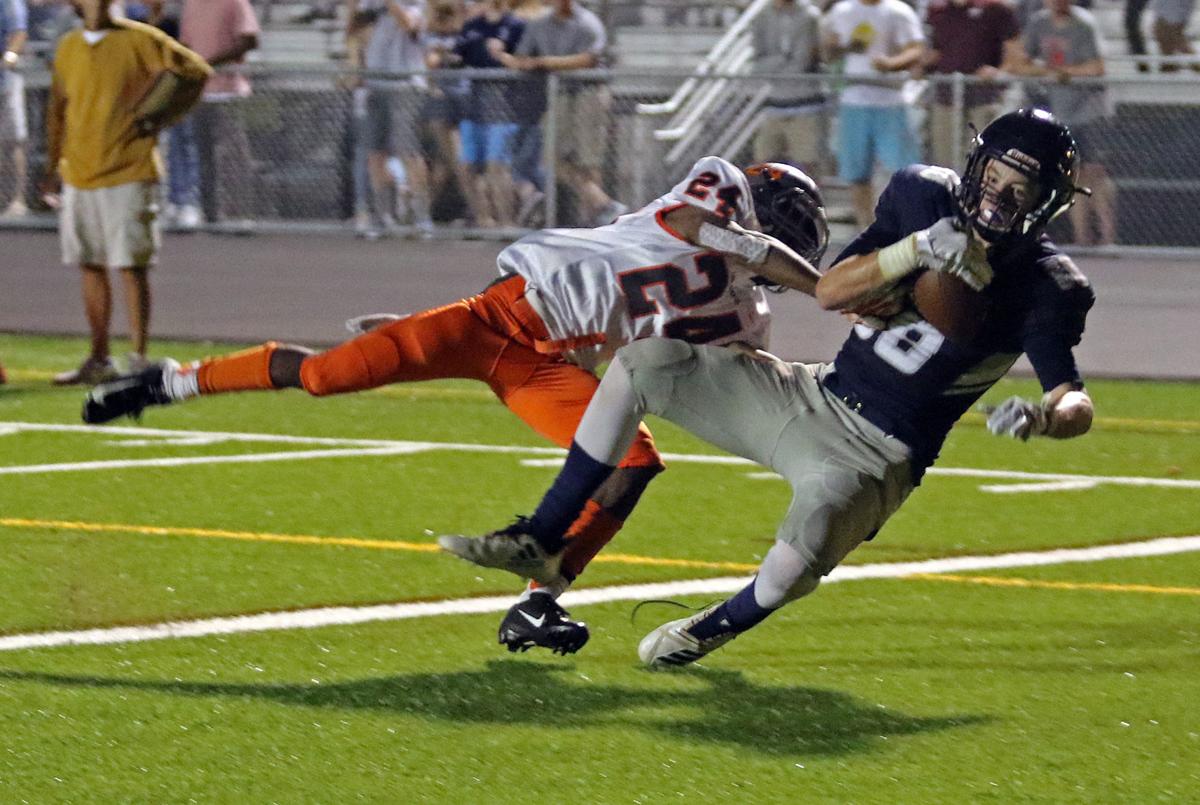 Douglas Freeman holds off charging Lee-Davis for 48-34 victory