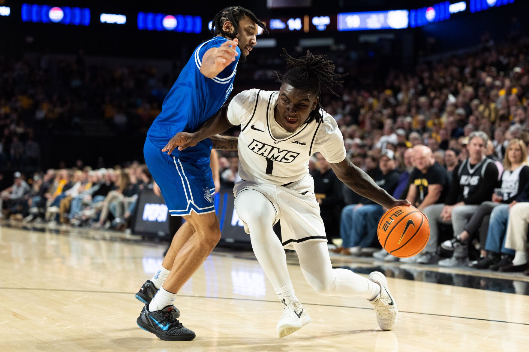 VCU's Nyk Lewis, UR's Will Harper have often shared court