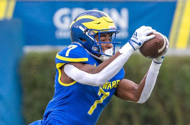 W&M sought Tucker/VMI grad Michael Jackson. He'll arrive in Delaware gear.