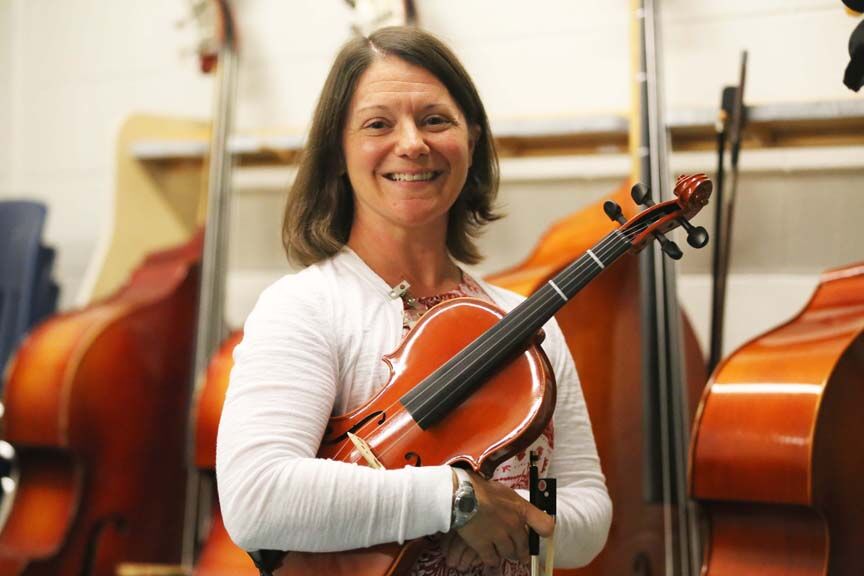 HCPS strings teacher honored with music education award