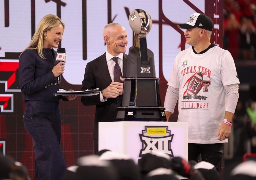 Texas Tech head coach Joey McGuire stands with commissioner Brett ...