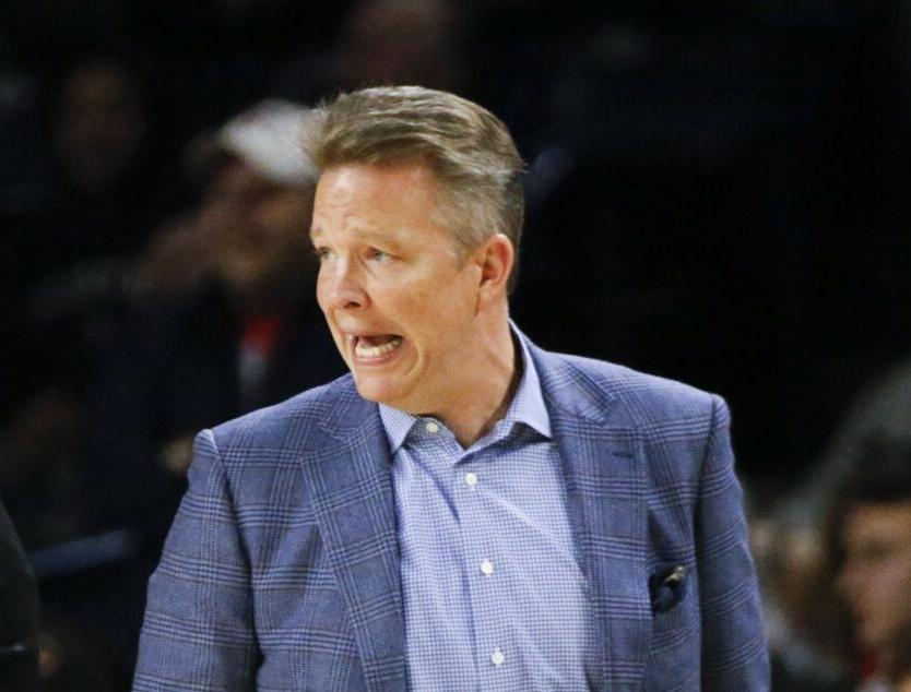 Spiders coach Chris Mooney will step away while addressing heart issue