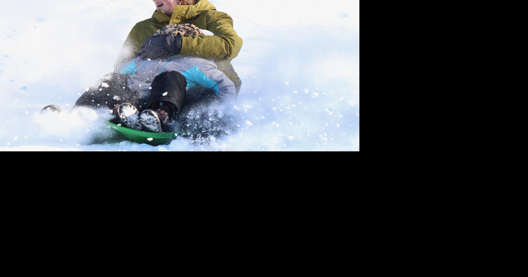 Having a snowy good time: Noon Kiwanis sleds into 100th-anniversary ...