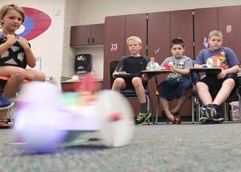 Chariots of Fun! How do you use a robotic ball to pull a chariot? Just ...