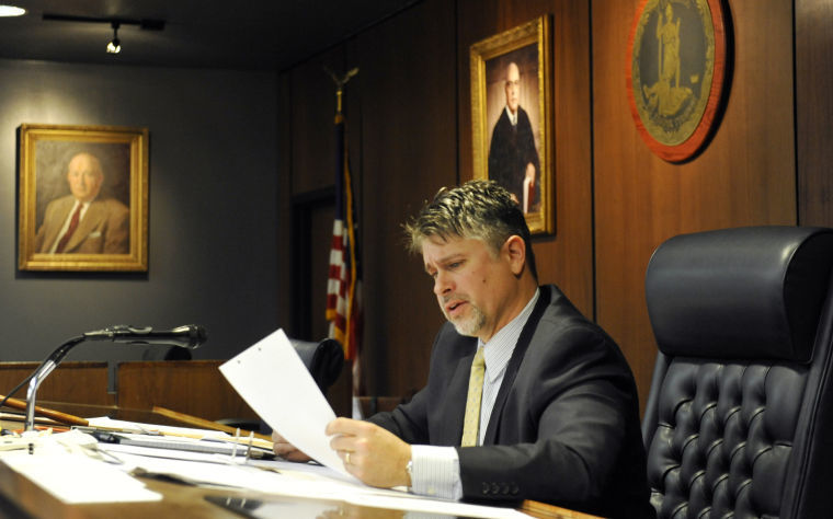 H&R Block sign taxes Radford prosecutor