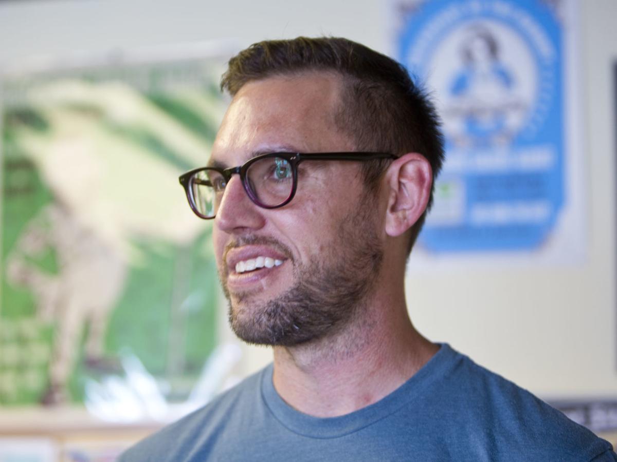 Photos: Friends pay their respects to John Albright at the Blacksburg Farmers Market