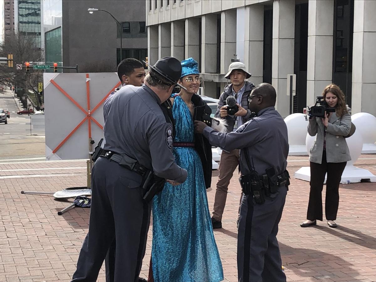 Judge orders ERA activist who exposed breast outside Capitol held ...