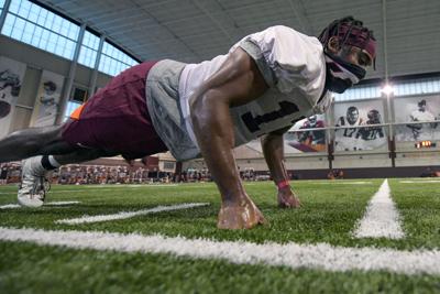 Virginia Tech football opens restructured fall camp running under ...