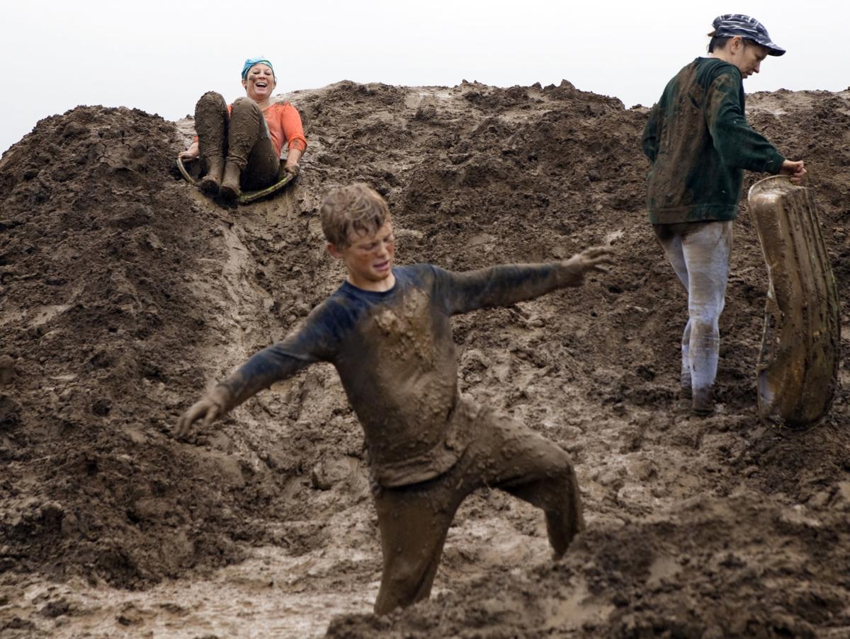 Photos: Playing in the mud at a rainy River's Edge