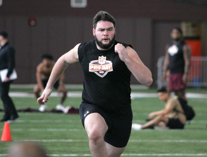 Brock Hoffman gets the heavy lifting out of the way under the watchful ...