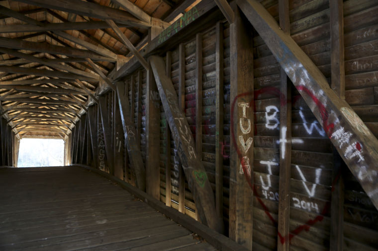 Vandals leave their mark on historic Humpback Bridge | Local News ...