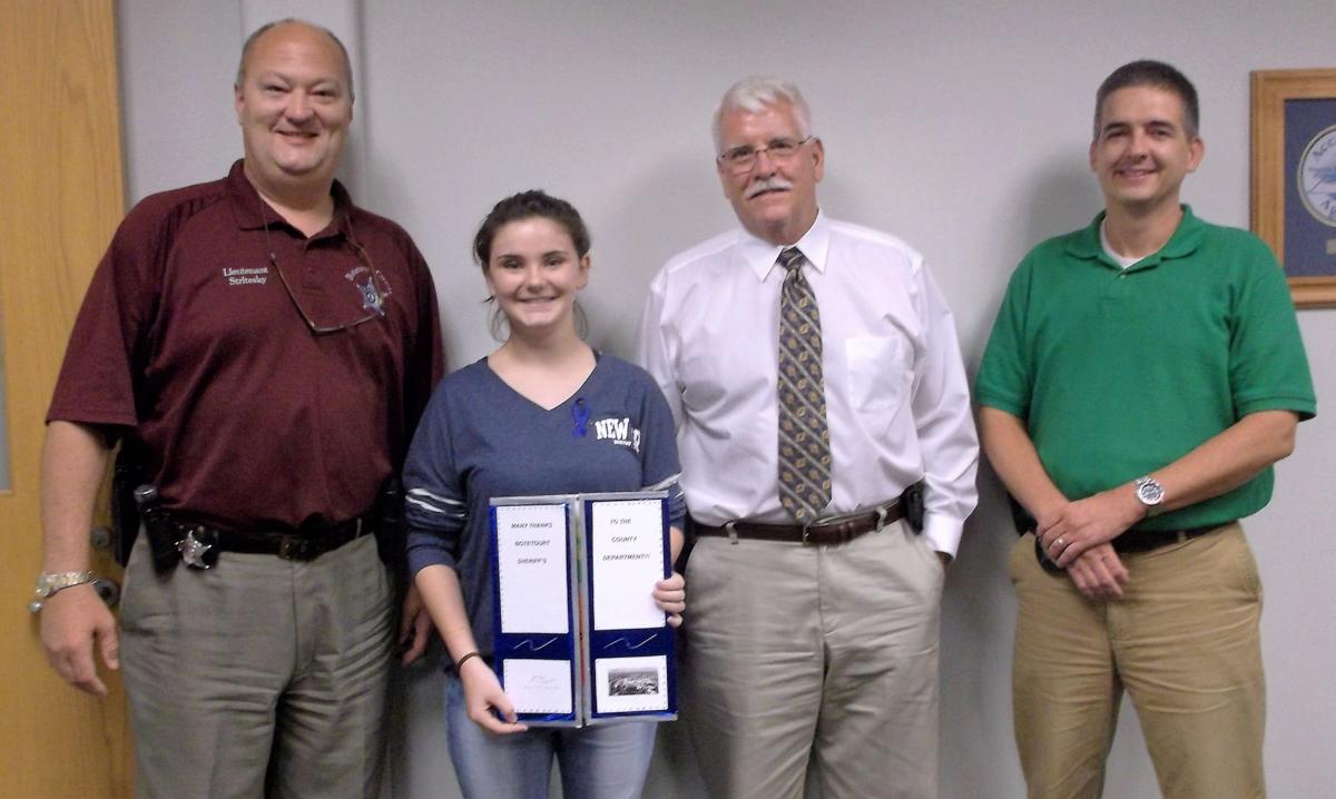 Photo: Teen presents cookies, thank-you to sheriff's department ...