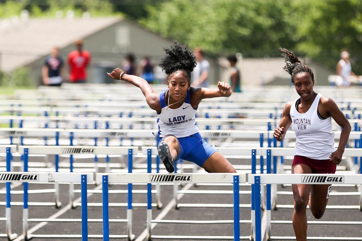 Scenes from the Region 5D West track and field meet at William Fleming