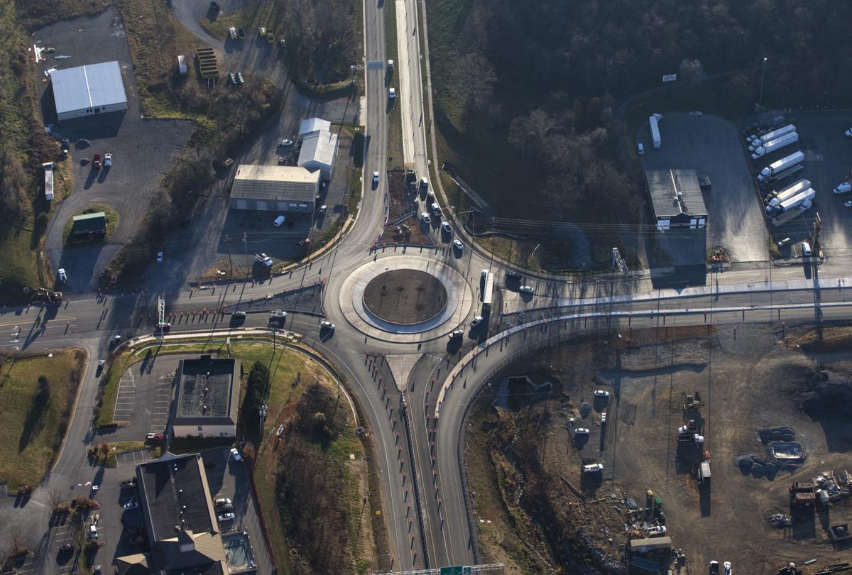 WOYM: A 'wicked-hard' guide to navigating and signaling in roundabouts
