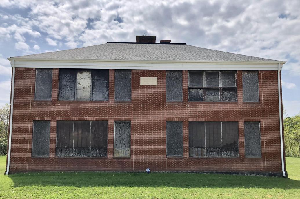 Who will restore the Edgar A. Long Building?