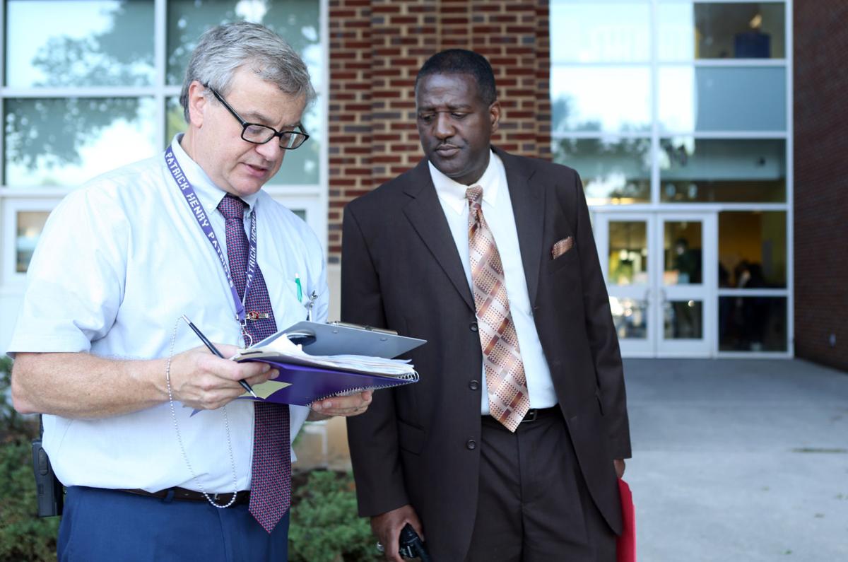Photos: New Principal Anthony Frazier greets students at Roanoke's ...