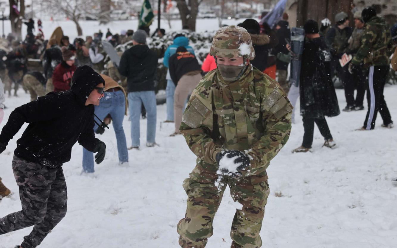 Photos: Tuesday's snow, including an epic snowball battle at Virginia Tech