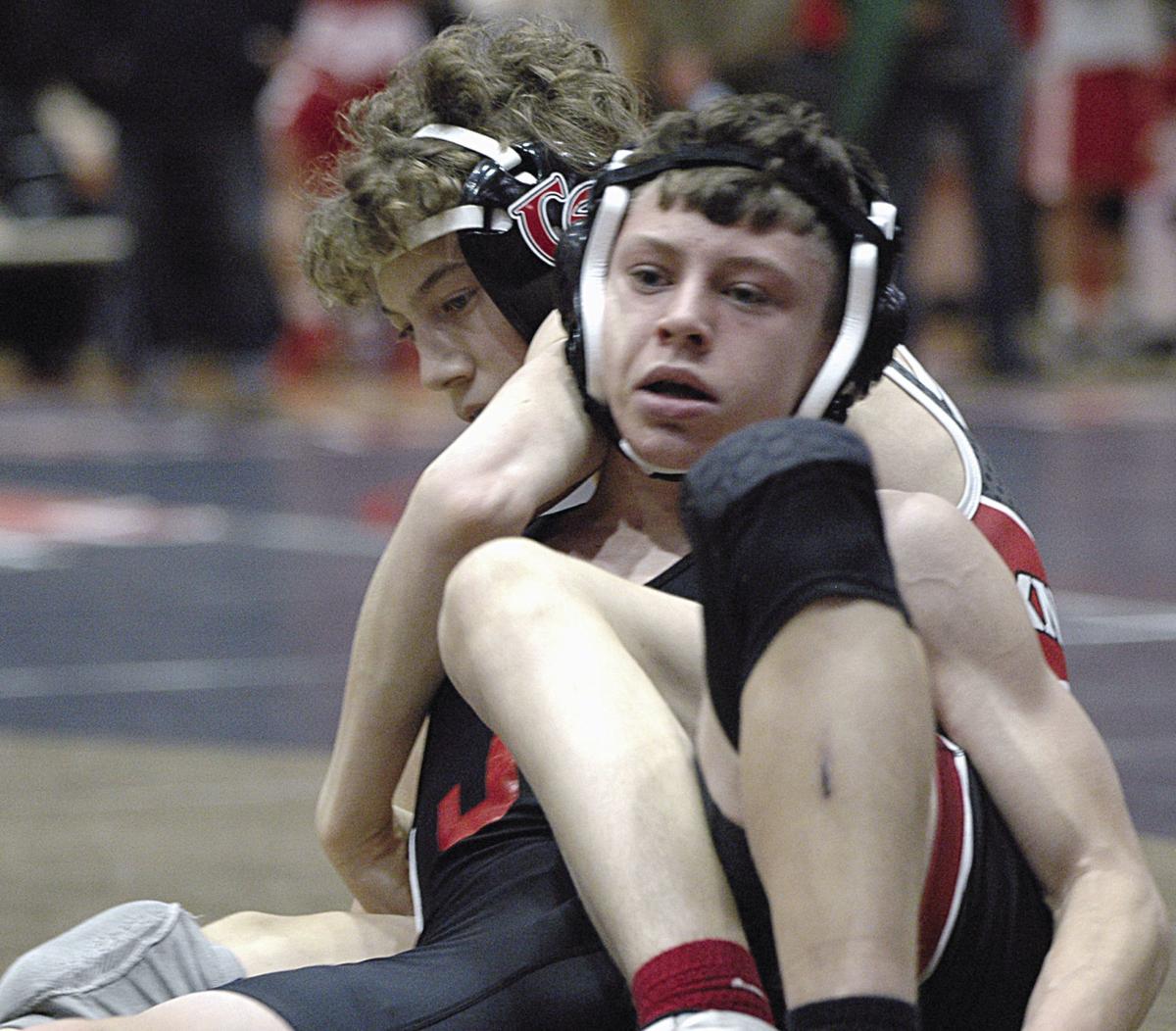 H.S. wrestling: Cave Spring comes out on top in return of Johnny Price ...