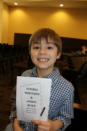 Photo: 3rd-grader Caleb Franklin honored for haiku, art