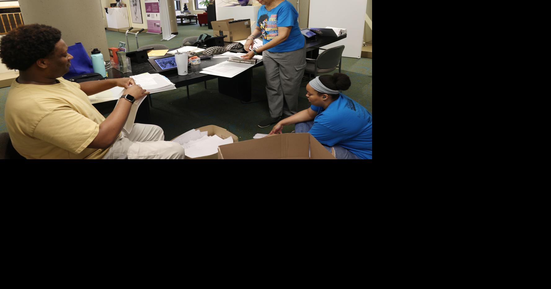 Harrison Museum packing artifacts for Melrose Plaza move
