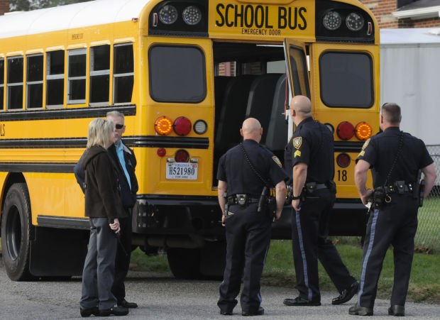 Students searched after gun is reported on school bus