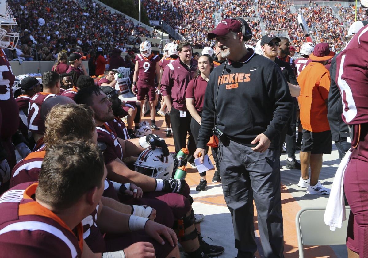Virginia Tech assistant Joe Rudolph greets summer offensive line ...