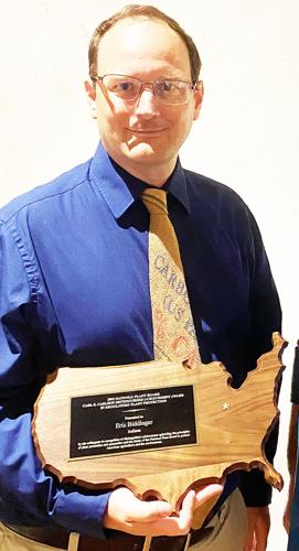 Biddinger receives national award | News | rochsent.com