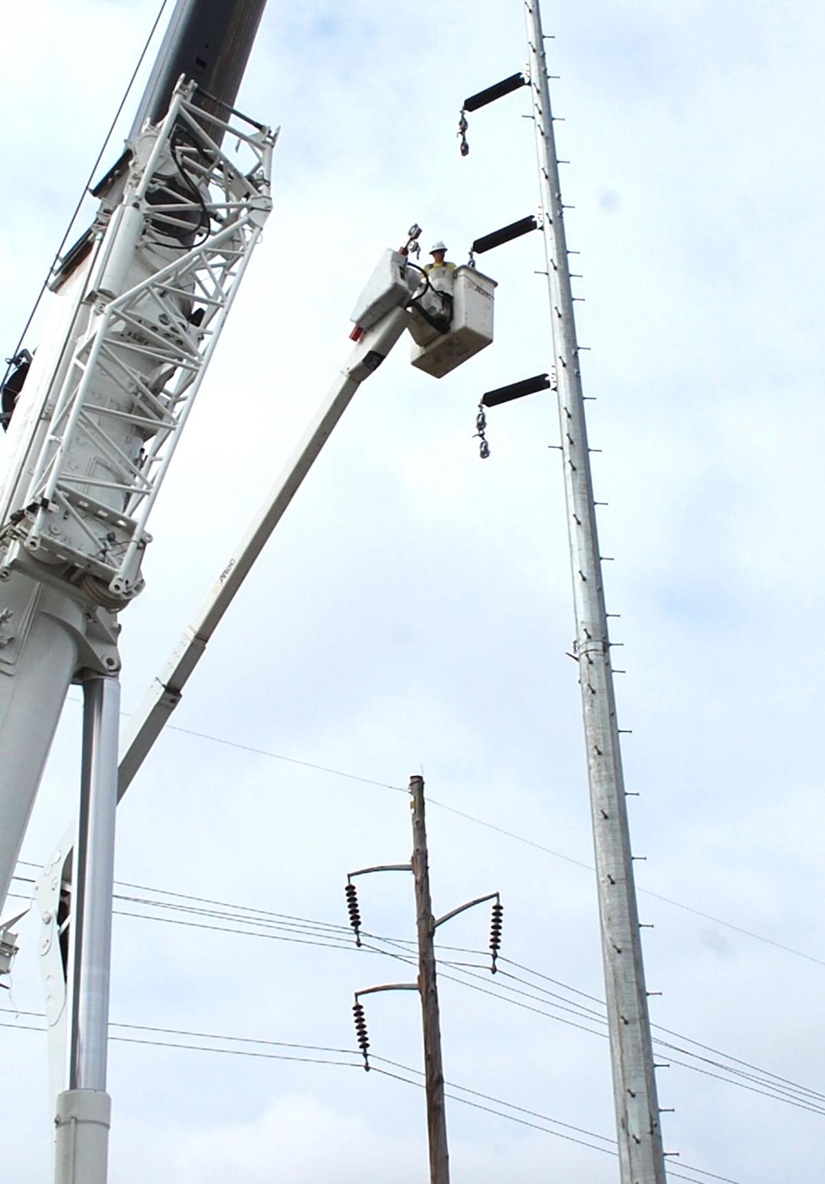New power line poles being installed on Hwy. 278 | Newton ...