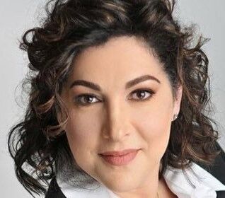 Daughter of legendary basketball coach to speak at women's conference ...