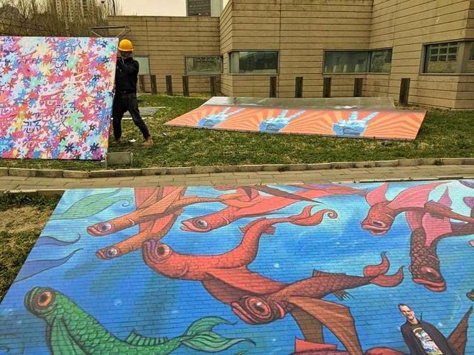 ECU professor's mural on display outside U.S. Embassy in China ...
