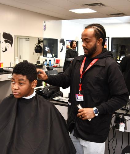 Toddler's first haircut courtesy of college program's holiday season ...