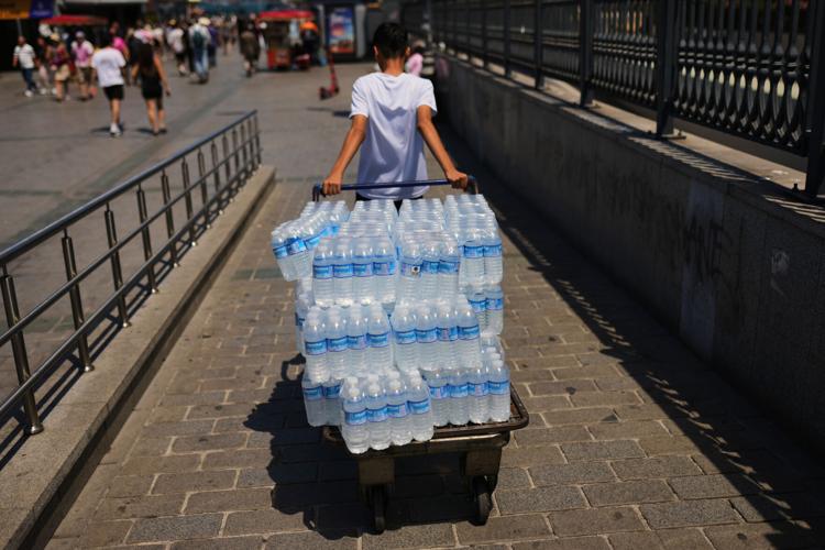 France restricts public alcohol consumption and outdoor sports as heat ...