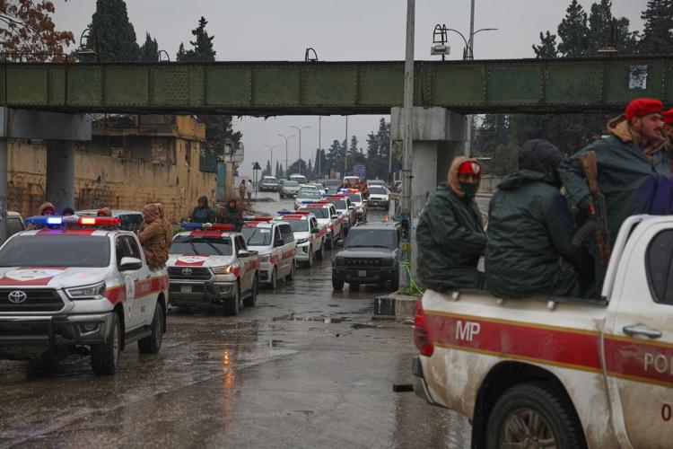 Photos show Syrians returning home following clashes between government ...
