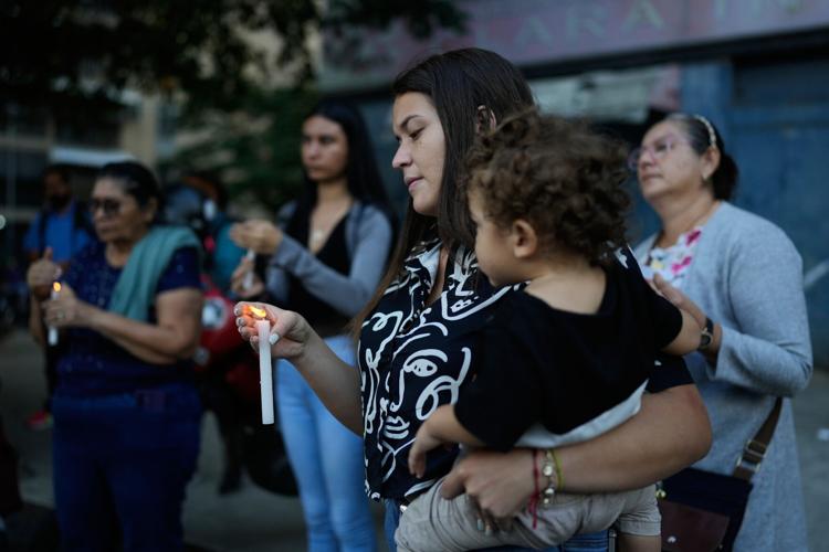 Photos show relatives waiting outside prisons as Venezuela frees a ...