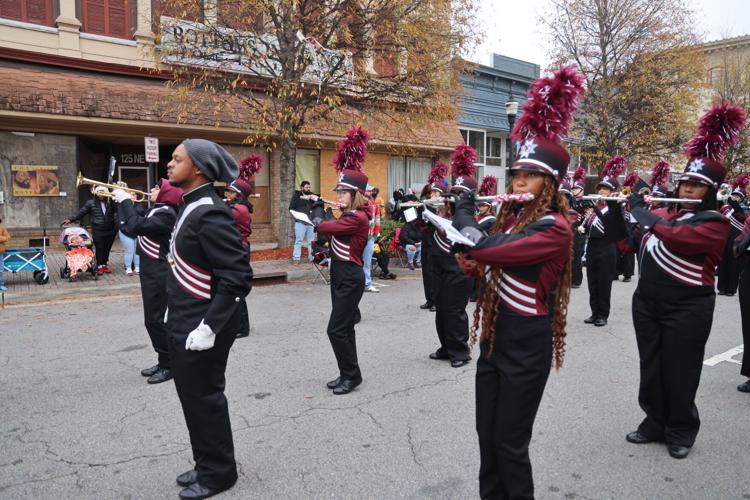 Parade brings out throngs of festive holiday revelers — and a Grinch ...