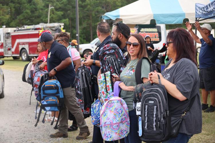 Police dole out book bags, school supplies to nearly 500 | Local News ...