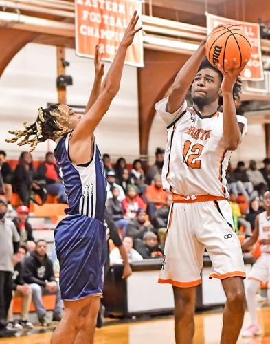 BOYS BASKETBALL: Warriors sustain fast pace, overcome Jaguars | High ...