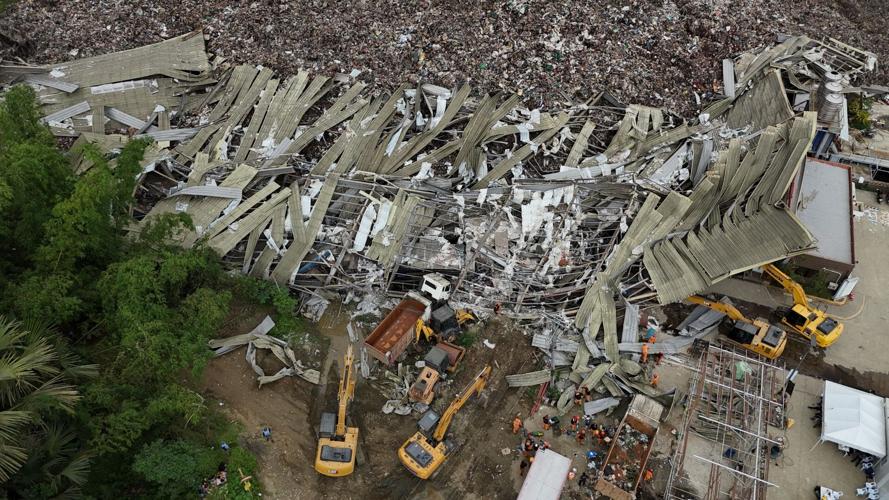 Photos show aftermath of avalanche of garbage at a Philippines landfill ...
