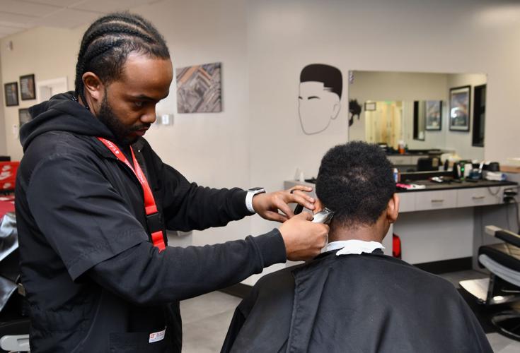 Toddler's first haircut courtesy of college program's holiday season ...