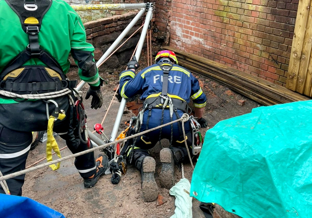 Firefighters rescue man who plunged 30-feet down street well | National ...