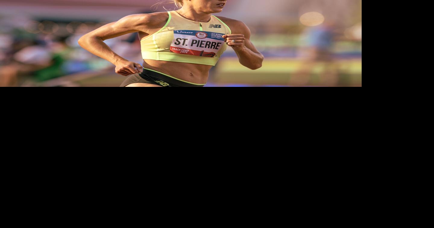 Elle St. Pierre wins women's 5,000m final as her son Ivan cheers from ...